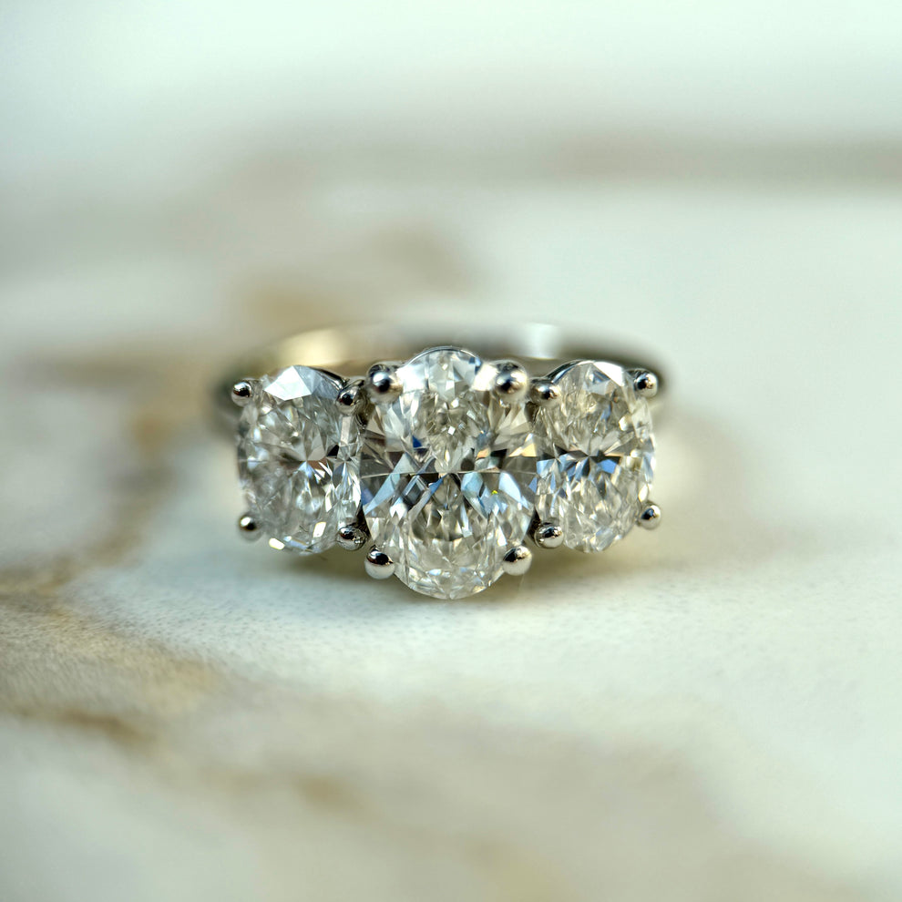 Classic Oval Trilogy - 3ct+ (D/E & VVS main diamond) – London Diamonds